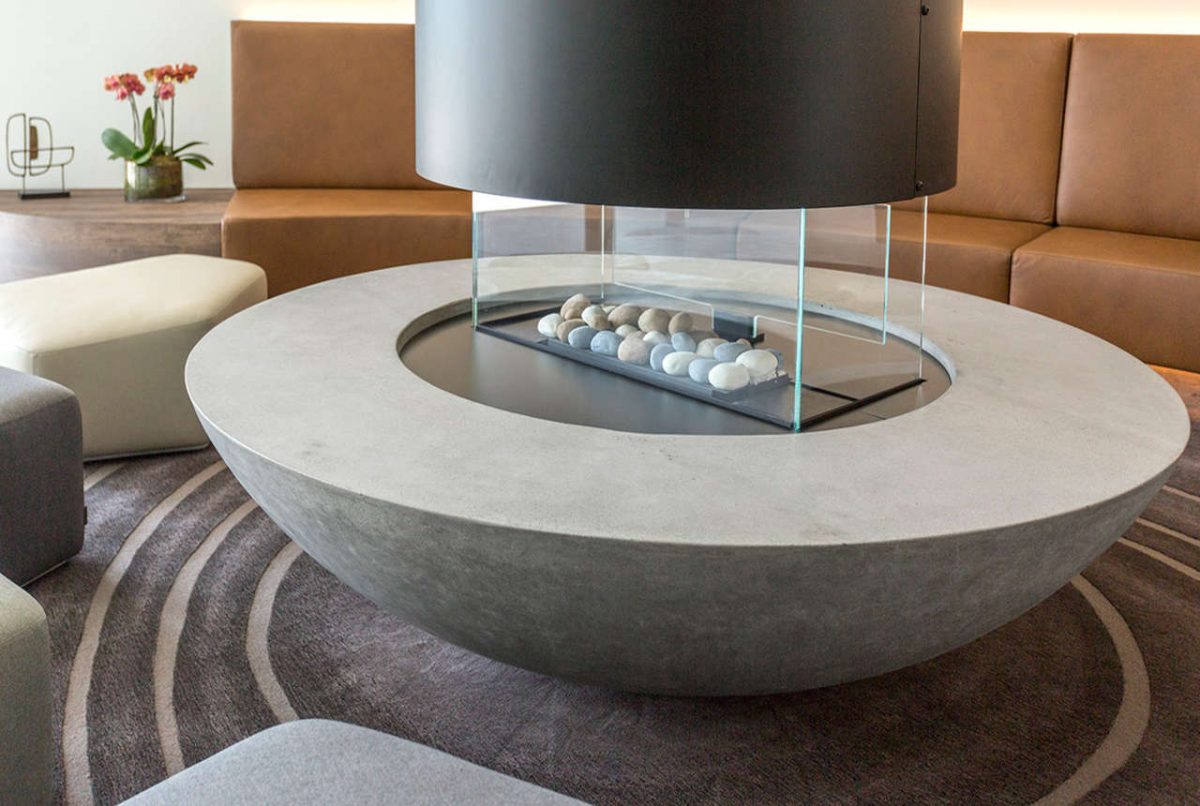 Forge Apartments • Large concrete fire pit by SVC Products